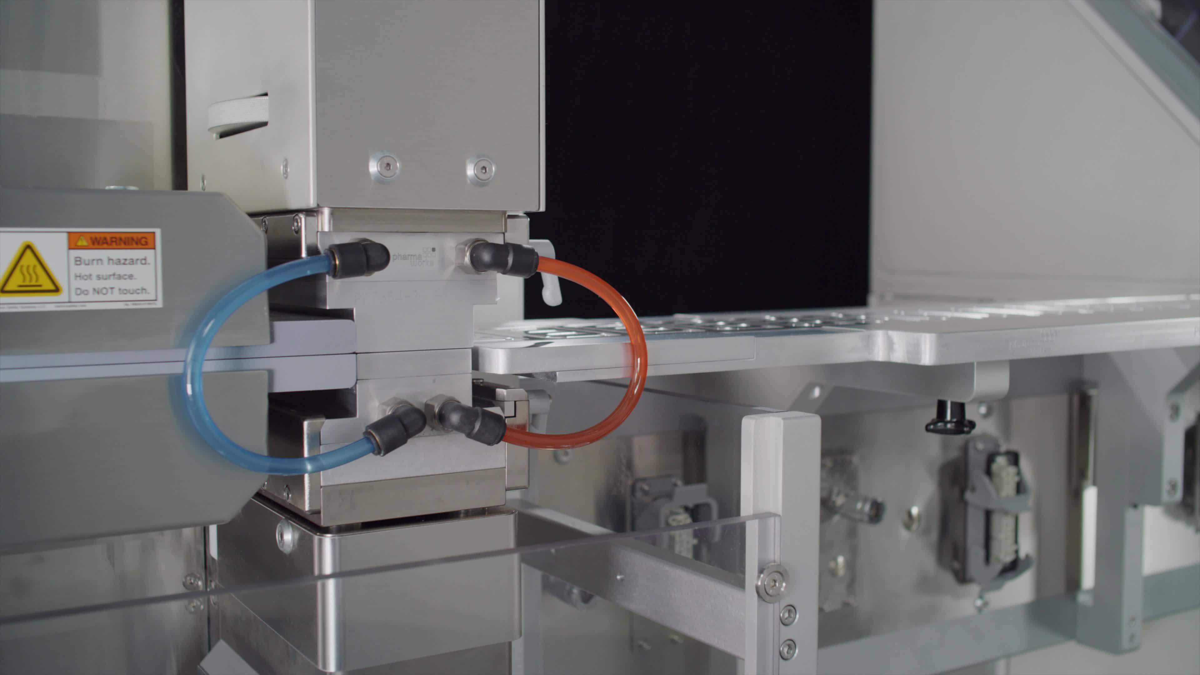 TF2 Blister Machine w/Custom Robotic Feed System | Device Packaging ...