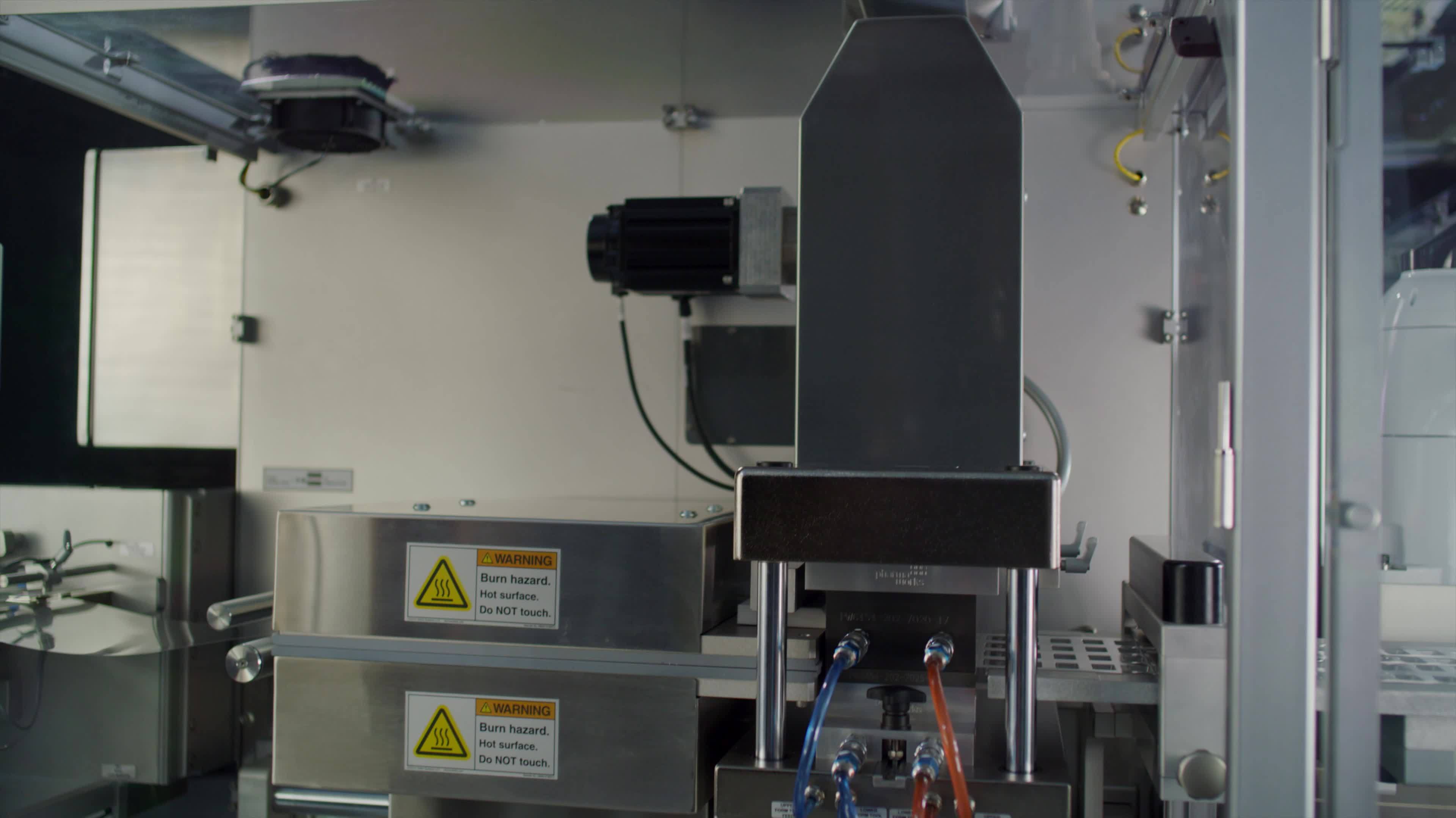 TF2 Blister Machine w/Custom Robotic Feed System | Device Packaging ...